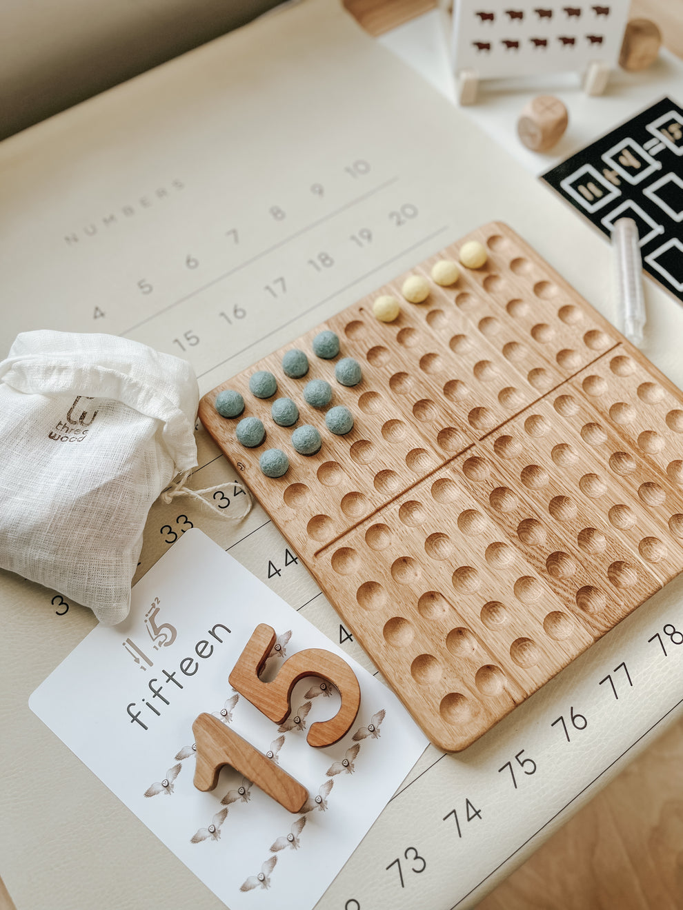 Montessori hundred board with numbers 1-100 and felt balls – THREEWOOD